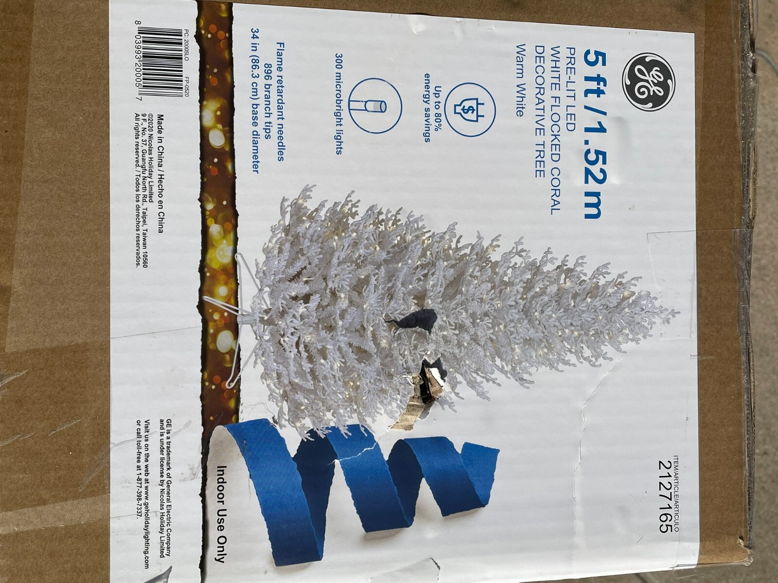 GE Pre-Lit Traditional Slim Flocked Artificial Christmas Tree with 300 ...