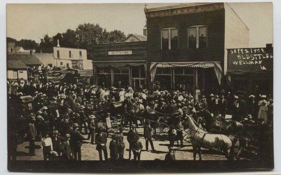 1908 Wellman Iowa Main Street Real Photo postcard Old Settlers Week | eBay