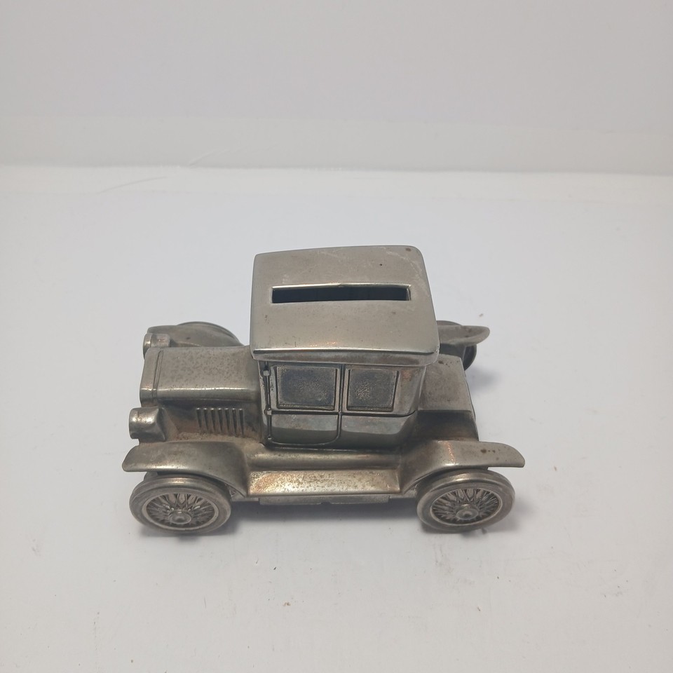 Vintage coin bank shaped like a Ford Model T Coupe. | eBay