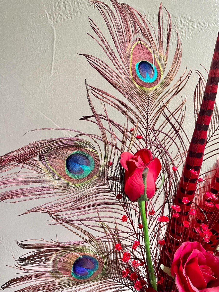 Centerpieces Red Roses And Feathers