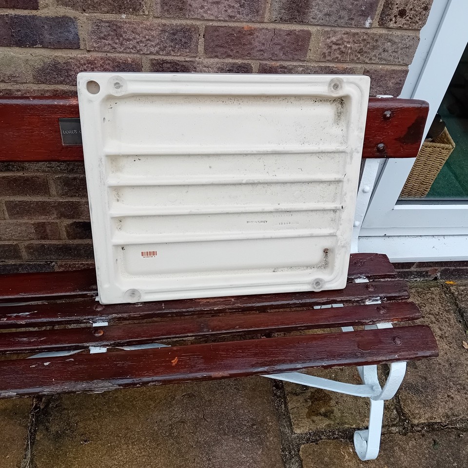 A Classy White Ceramic Indented Draining Board with Plastic Stoppers ...