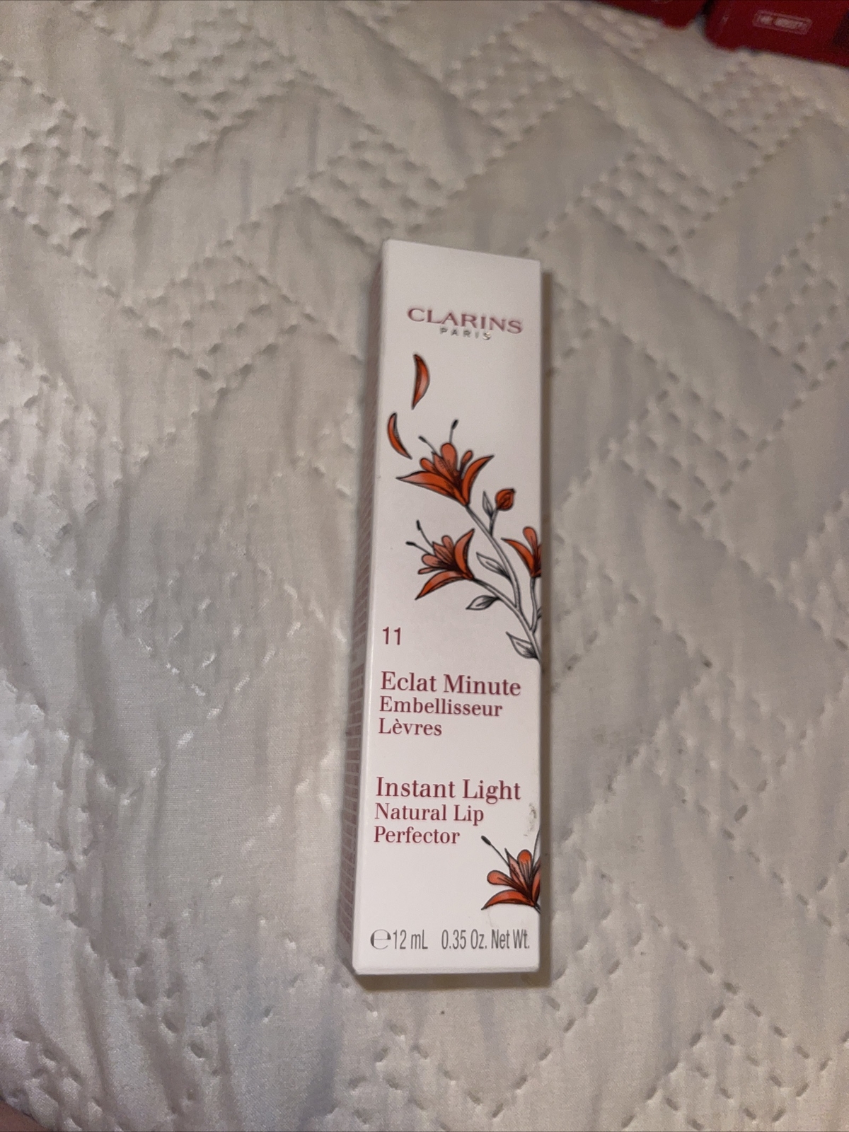 Clarins Eclat Minute Instant Light Natural Lip Perfector Orange Shimmer ...
