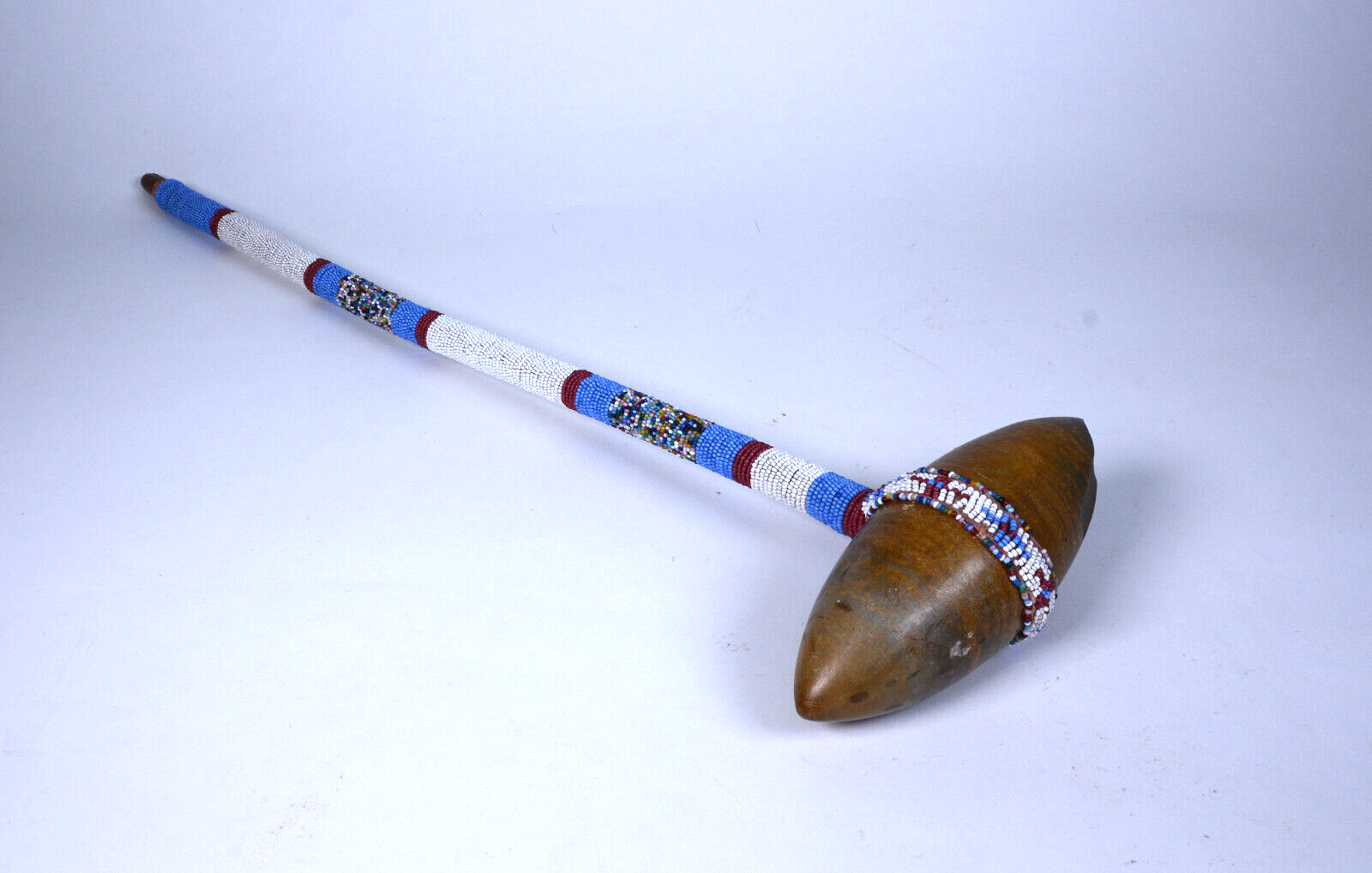 Northern Plains Stone club with wood handle, beaded late 19th century ...