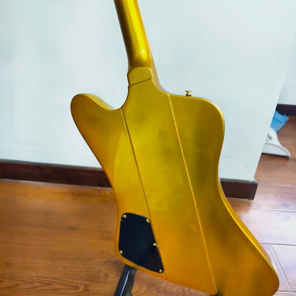 Custom Firebird gold electric guitar black fretboard, 2H pickups ...