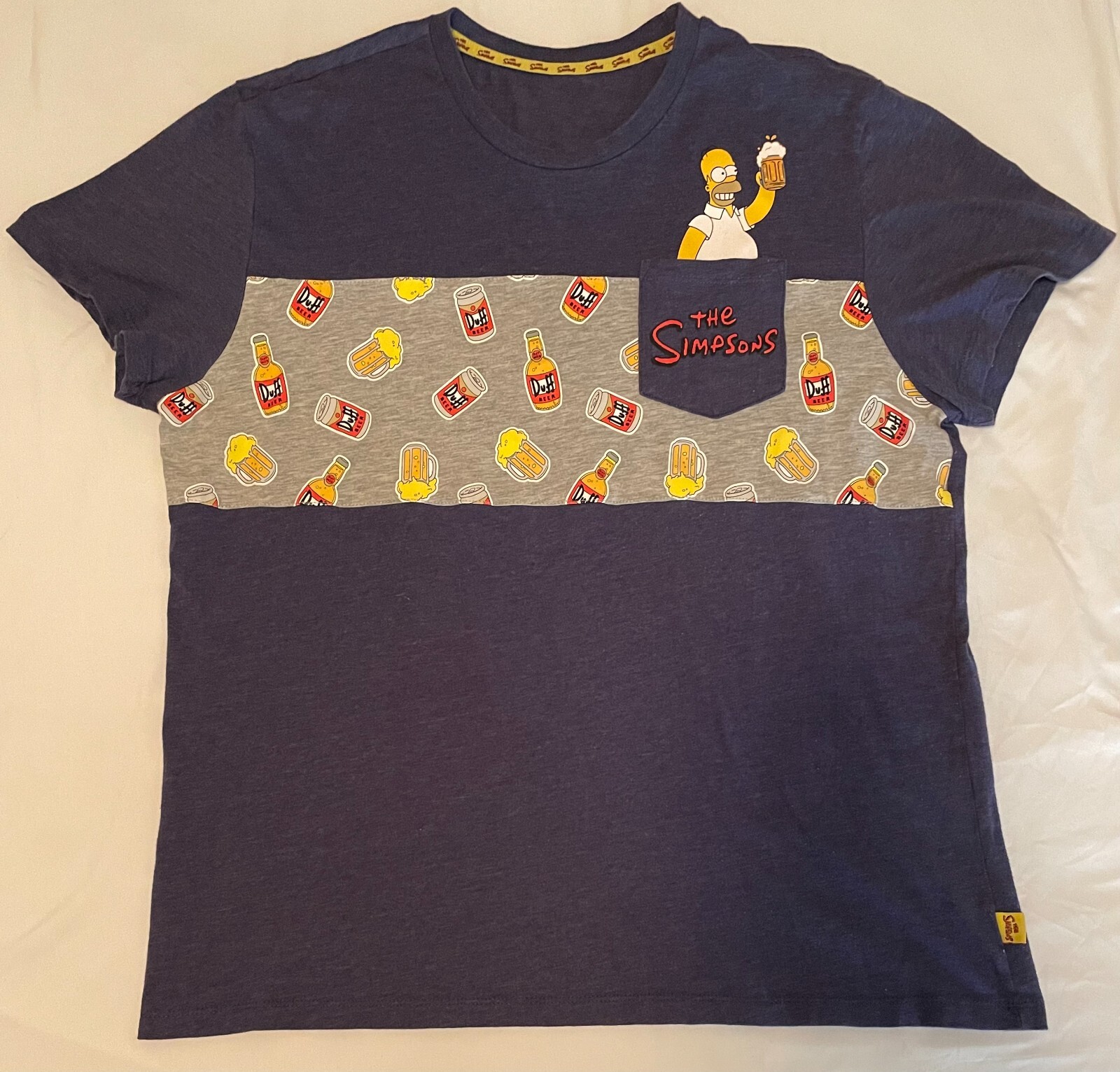 OFFICIAL BRANDED MERCHANDISE THE SIMPSONS DUFF BEER T… - Gem