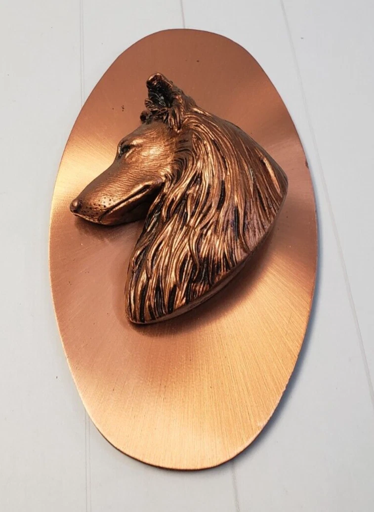 Copper Artwork Of Dogs