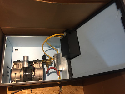 Coin-operated air machine - $1 Canada loonie - air pump-insulated box ...