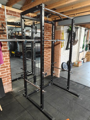 Power Rack with Pulley Cable System, Bumper Plates, Bars & More / Home ...