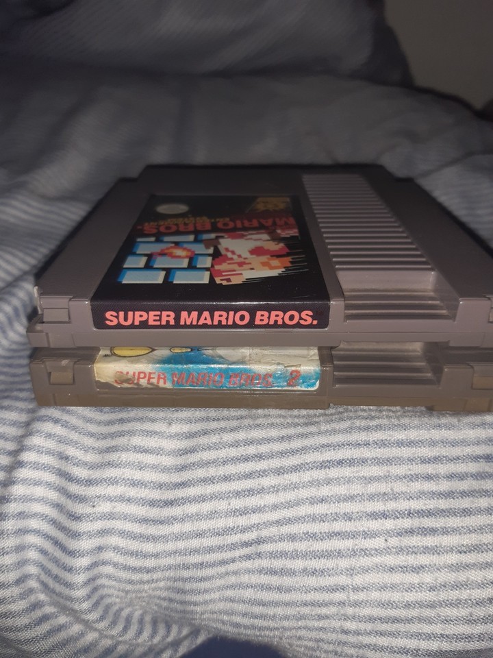 super mario 1 and 2 cheap. Tested and working. Please read before buy ...
