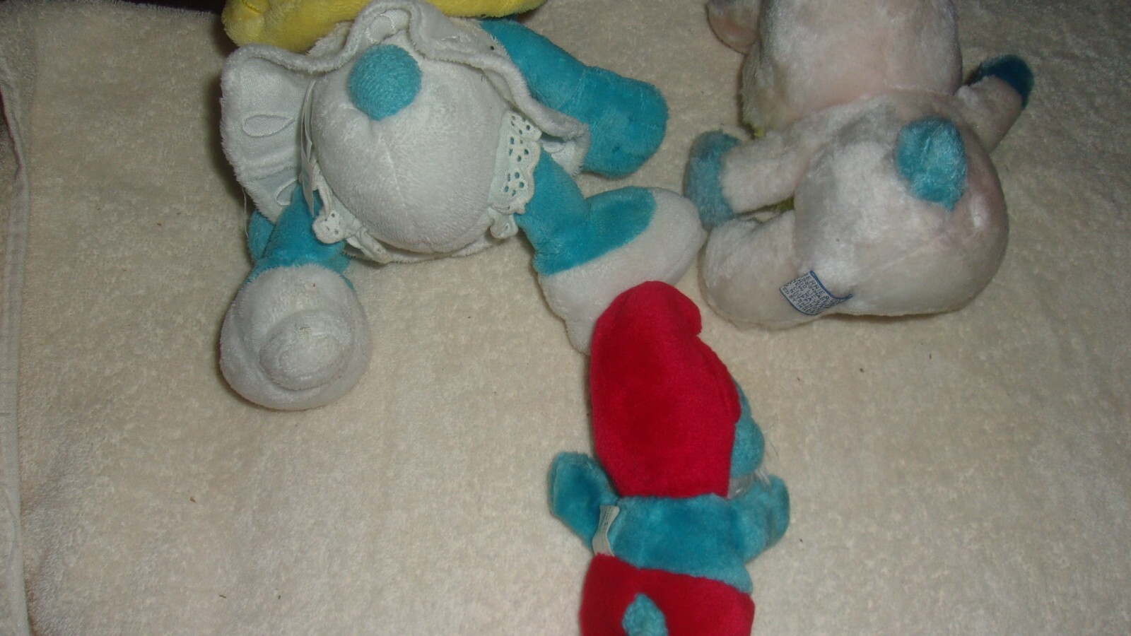 THREE VINTAGE SMURFS, GIRL, RABBIT SMURF, AND GRANDPA SMURF. WALLACE ...