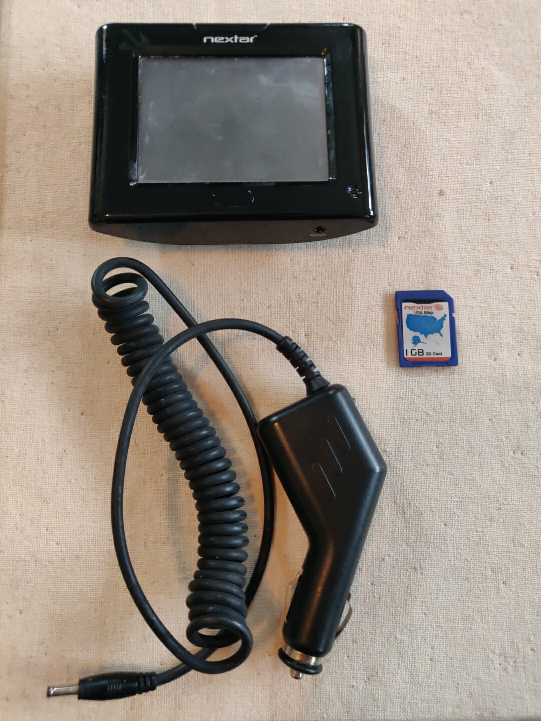 Vintage 2007 Black Nextar GPS Navigation System. With Car Adapter & 1 ...