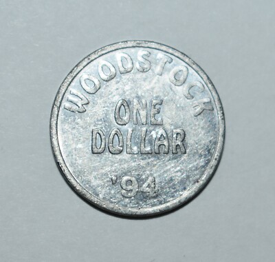 A5. ONE (1) 3/4" ALUMINUM TOKEN FROM WOODSTOCK CONCERT '94 ...