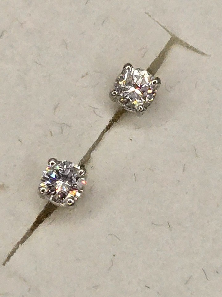 Pre-loved Genuine mined 0.30ct Diamonds set in 14ct gold stud earrings ...
