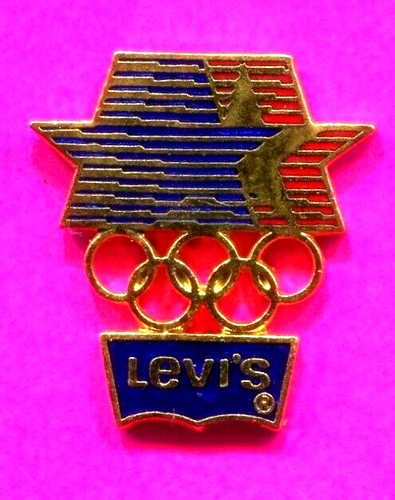 1984 OLYMPIC LEVIS PIN STARS IN MOTION OVER GOLD OLYMPIC RINGS PIN | eBay