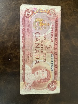 1974 Canadian two-dollar bill featuring Queen Elizabeth II on the front ...