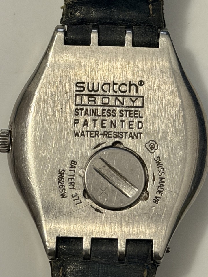 Swatch Irony swatch®JRONMSTAINLESS STEEL PATENTED WATER-RESISTANTSWISS ...