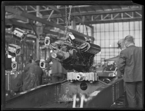 Engine being hoisted into Wizard Smith's car in a warehouse, NSW, - Old ...