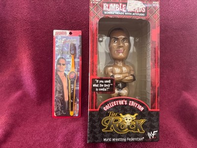 "The Rock" bobblehead and toothbrush | eBay