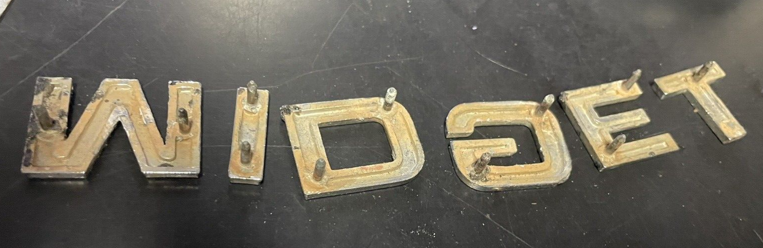 MG Midget emblem 1970s letters MGB lower rocker panel--B68 | eBay