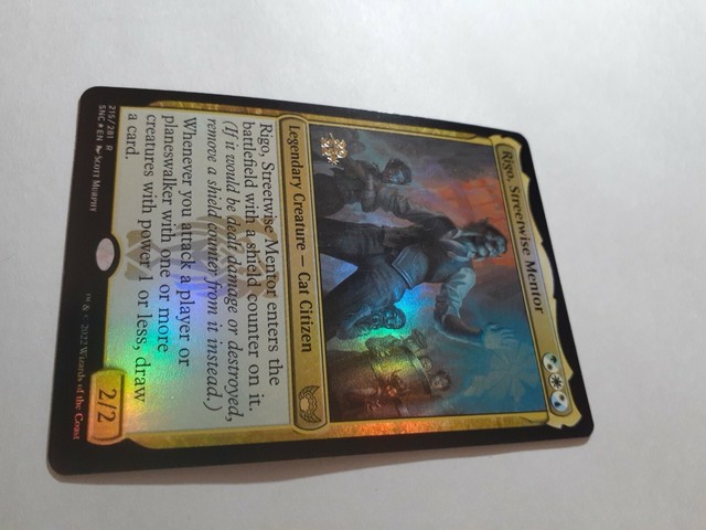 MTG Rigo, Streetwise Mentor Streets of New Capenna 215/281 Foil Promo ...