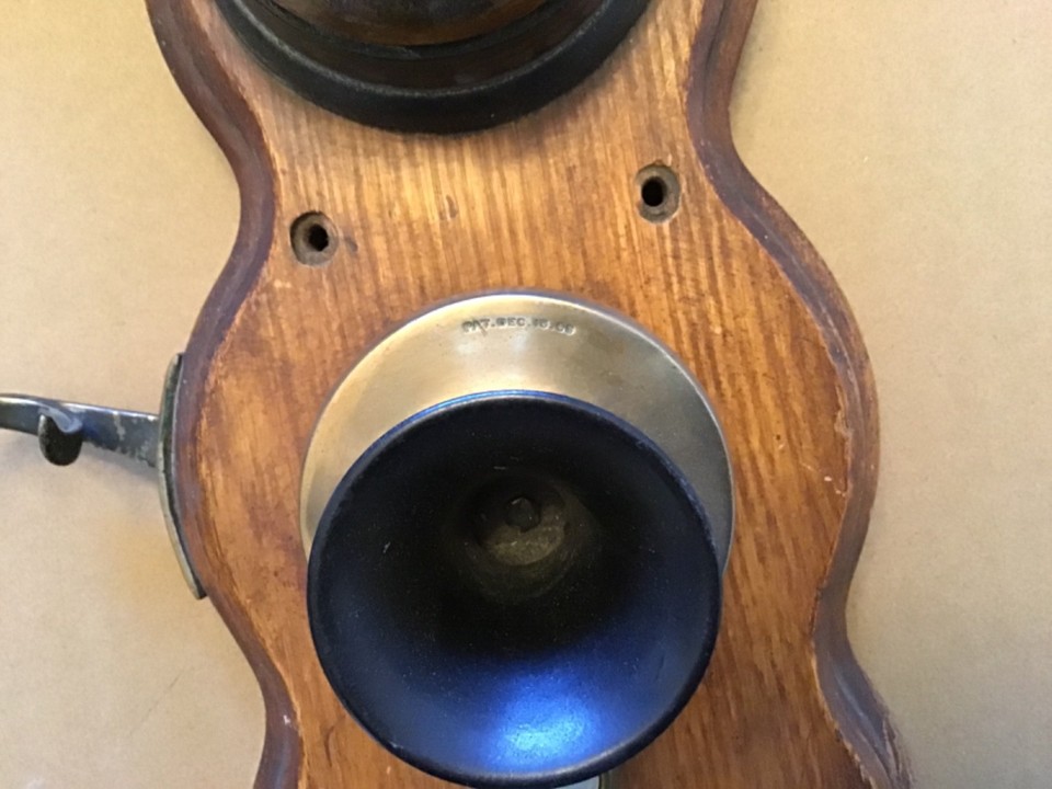 Early odd shaped oak wall phone 6 positions pat Dec 15,96 0n ...