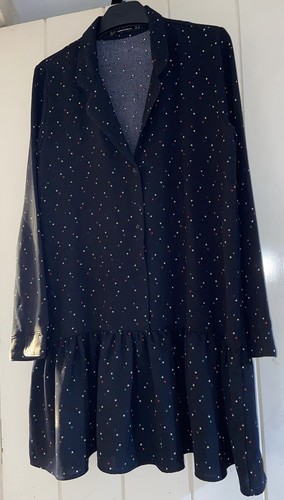 SIZE S BLACK SHORT DRESS WITH ALL OVER STAR PATTERN AND BOTTOM FRILL ...