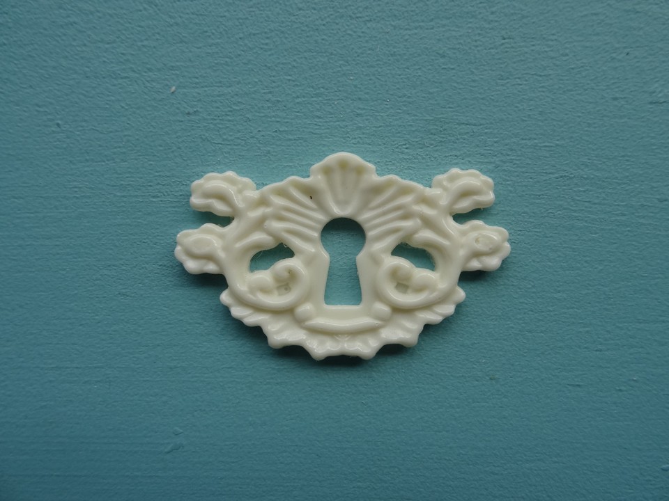 Decorative escutcheon and scrolls furniture moulding resin key hole ...