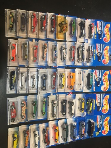 HotWheels 1990's Lot of 45 vehicles, Packaged new/old stock. Misc ...