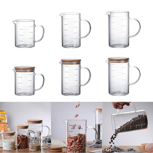 Graduated glass mugs, jugs, transparent heat-resistant containers ...