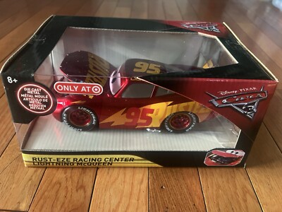2017 CARS 3 RUST-EZE RACING CENTER Lightning McQueen 1:24 JADA DIE-CAST ...