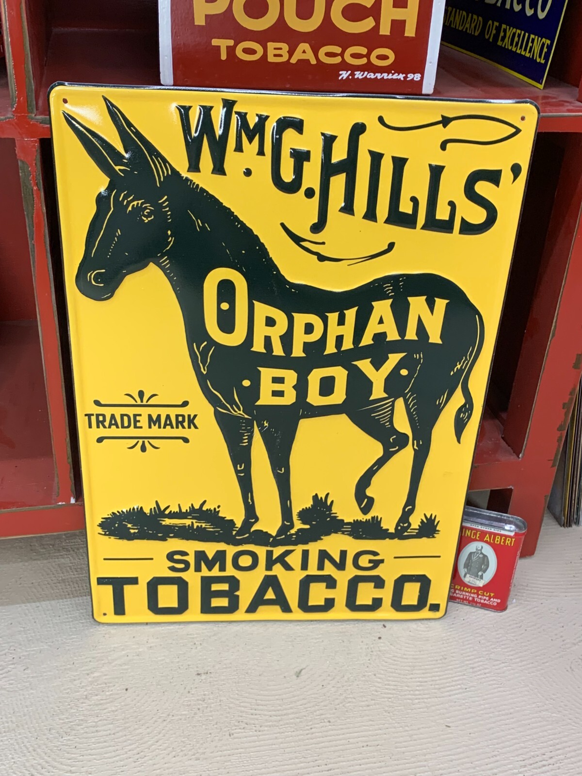 "ORPHAN BOY SMOKING TOBACCO" EMBOSSED METAL ADVERTISING SIGN, (20"x 14 ...