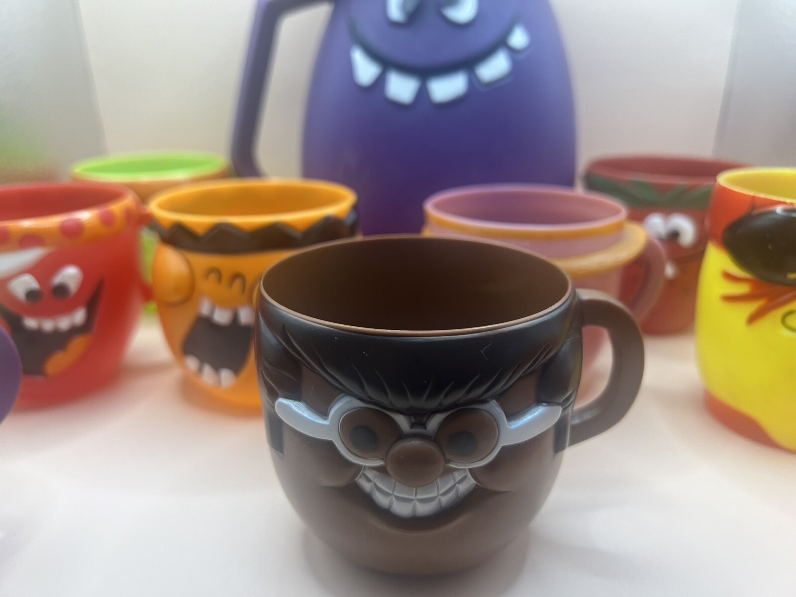 Pillsbury FUNNY FACE Set NINE MUGS & GOOFY GRAPE Pitcher W/ CHUG A LUG ...