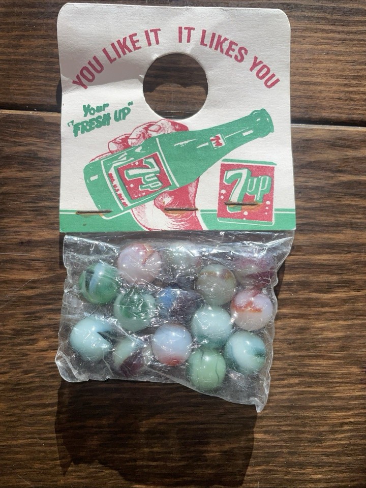 Old marbles in 7- Up package | eBay