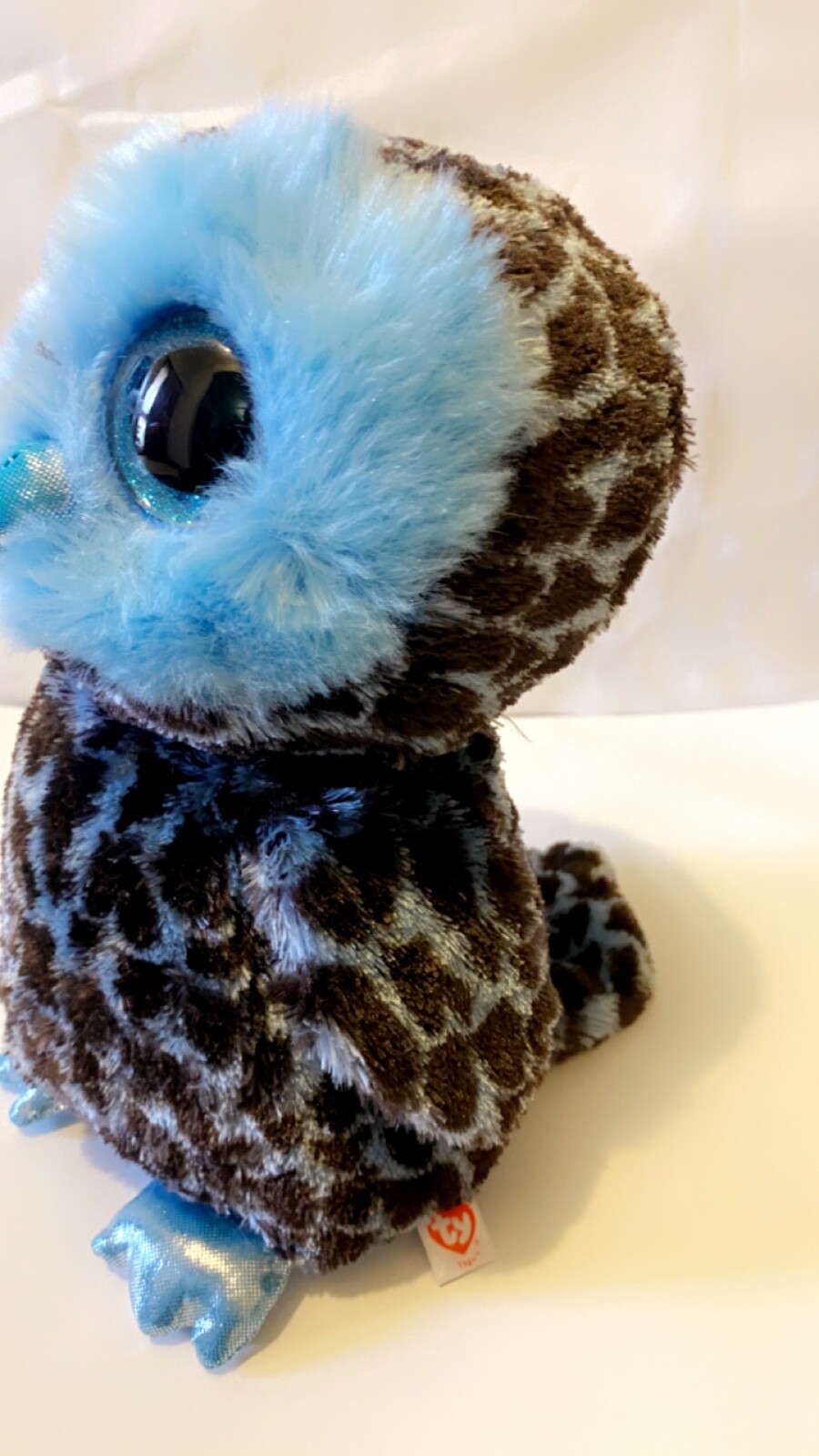 beanie boos Yago the owl. Has blue sparkly eyes, a blue beak and blue ...