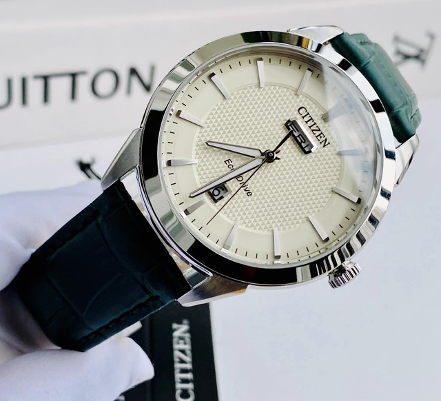 Citizen Eco-Drive Rolan Ivory Dial Green Leather Band Men's Watch ...