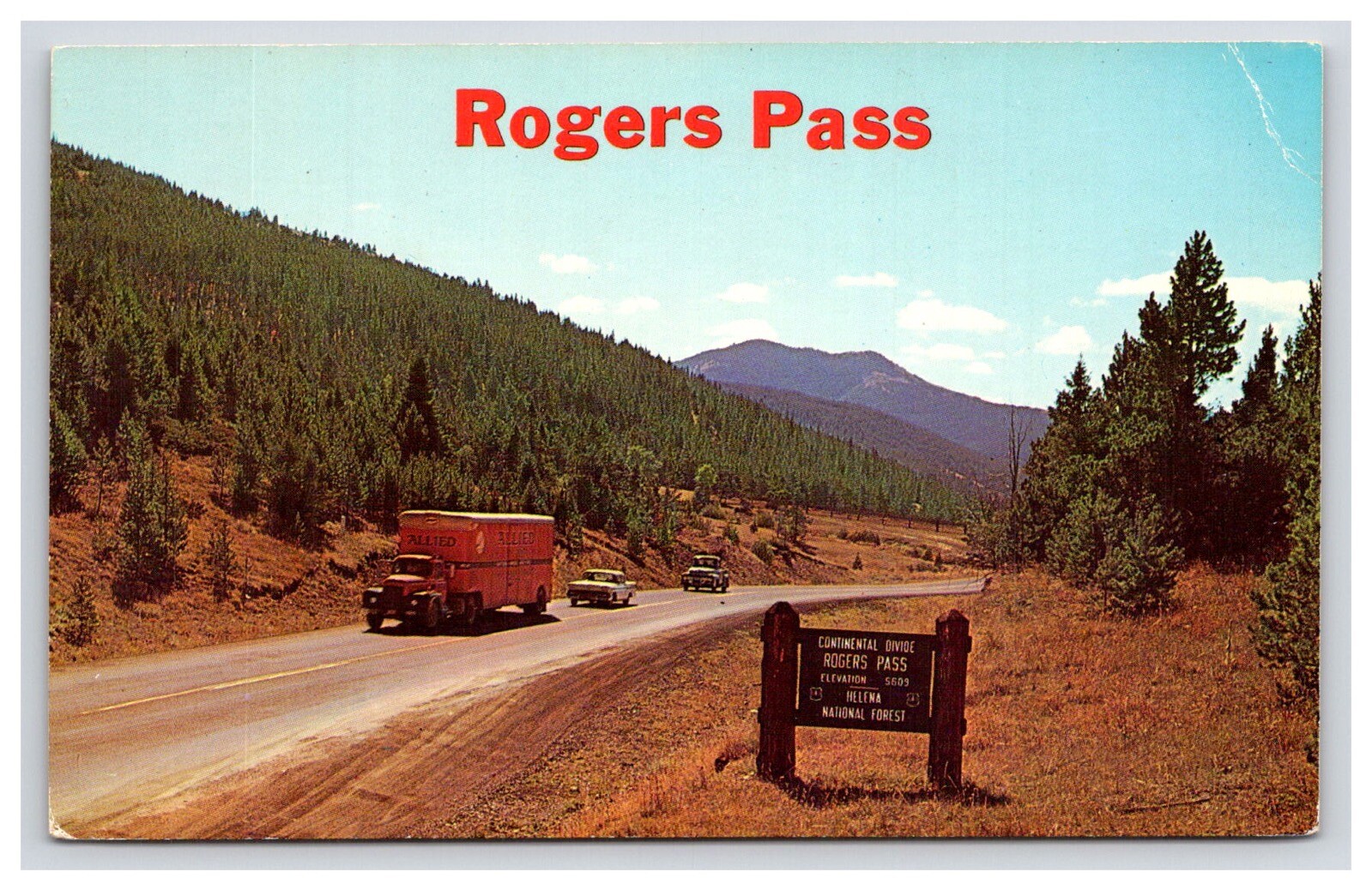 Postcard: MT Rogers Pass, Continental Divide, Old Trucks, Montana - Unposted | eBay