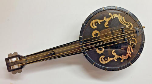 Vintage rootbeer Brown plastic Banjo shaped music box plays The Way we ...