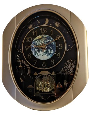 Small World Rhythm Cosmos Melodies Wall Clock Magic Motion Music Silver ...