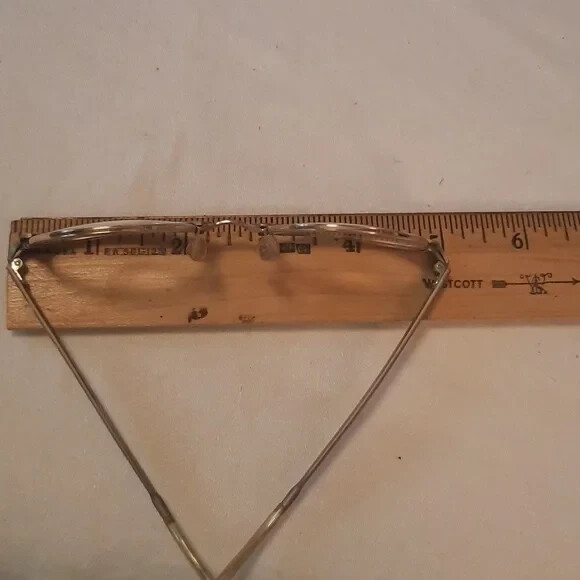 1950s cat eyes glasses frames. Labeled: 4 1/2 ALUM - Gem