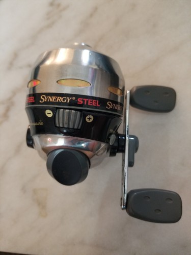 SHAKESPEARE SYNERGY STEEL SYN2001S10 SPINCAST CASTING REEL GOOD USED ...