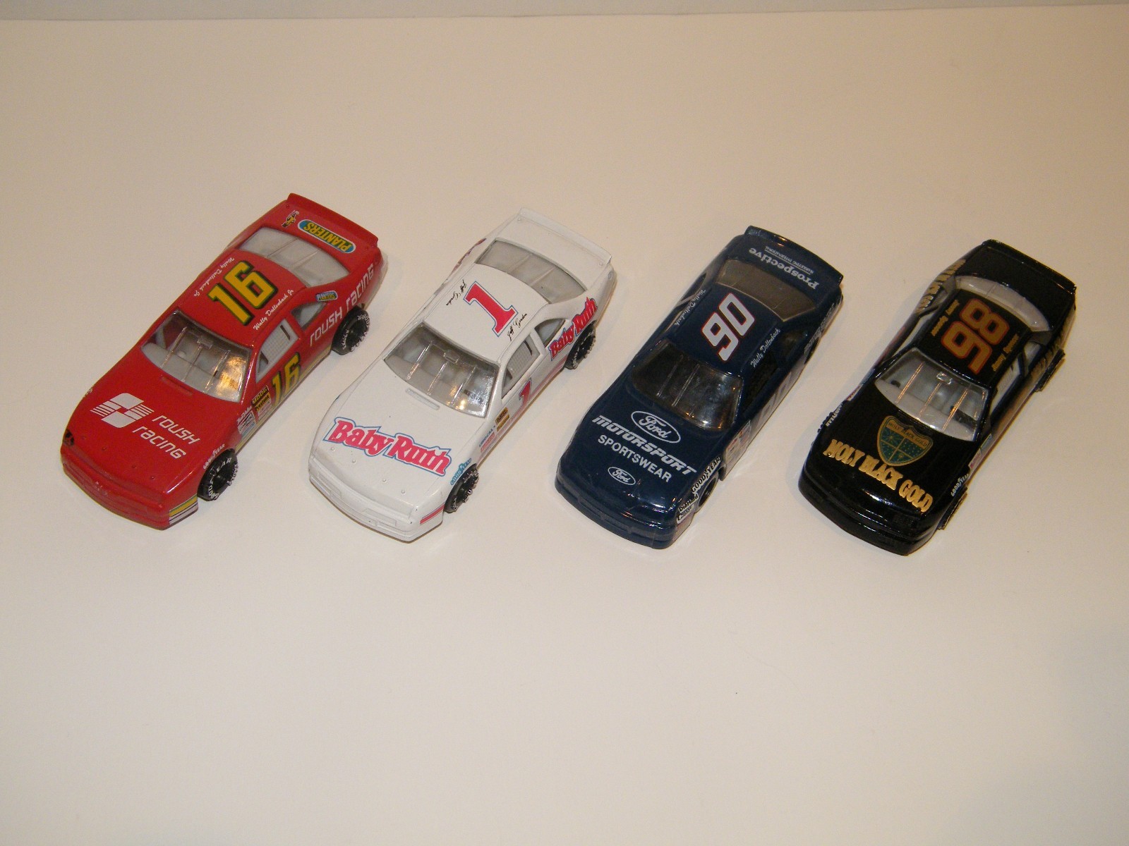 (4) NASCAR 4-1/2" RACE CARS ~ BABY RUTH, PLANTERS, MOLY MAX GOLD ...