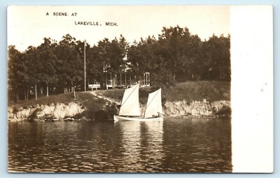POSTCARD RPPC Lakeville Michigan Sailboat 1904-18 Shoreline Cottage ...