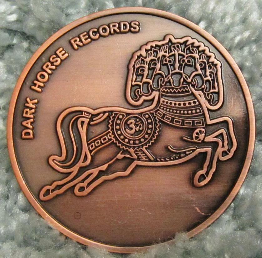 George Harrison Dark Horse Logo
