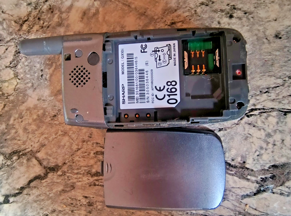 Sharp GX10i - Grey Flip Vodafone Mobile Phone | eBay