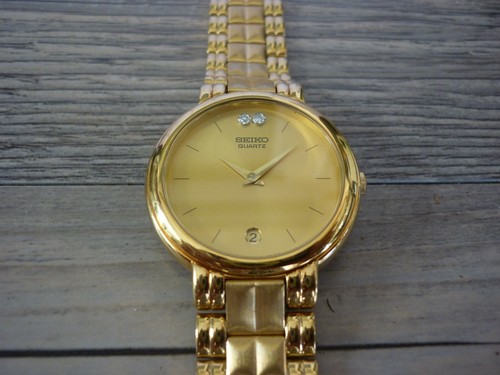 VINTAGE SEIKO QUARTZ WATCH SAMPLE MENS DRESS GOLD TONE NO MOVEMENT | eBay