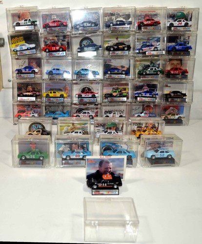 Lot of 39 - 1:64 diecast cars in plastic boxes w/info cards & display ...