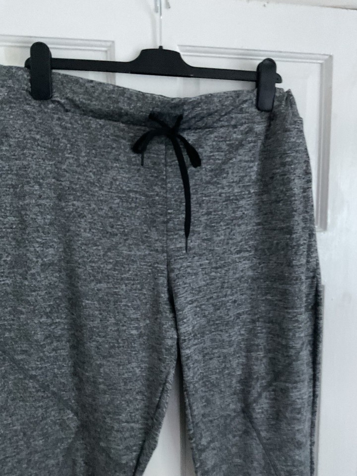 Ladies Souluxe black & white marl zip side pocketed tie waist ...