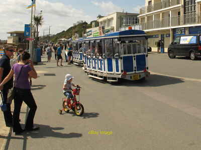 Photo 12x8 Land train and child cyclist by Boscombe Pier The land train ...