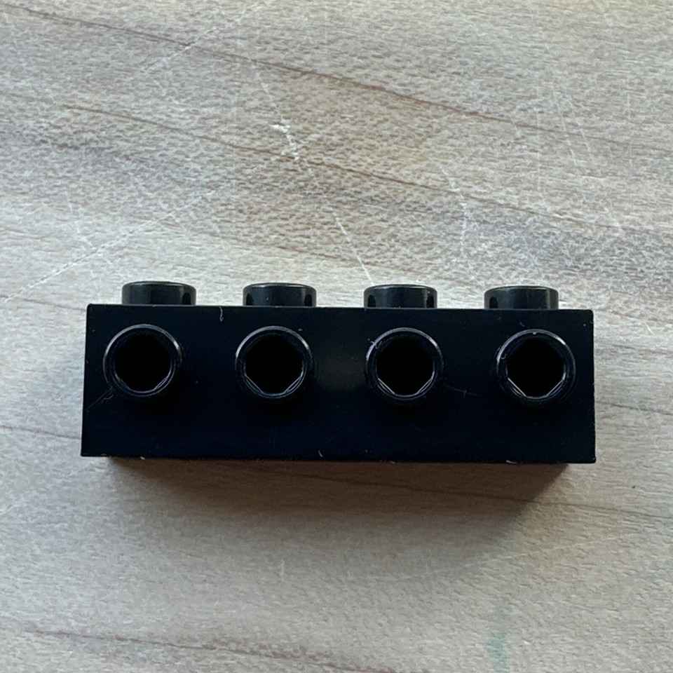 LEGO Piece: 1 count black Brick, Modified 1 x 4 with Studs on Side ...