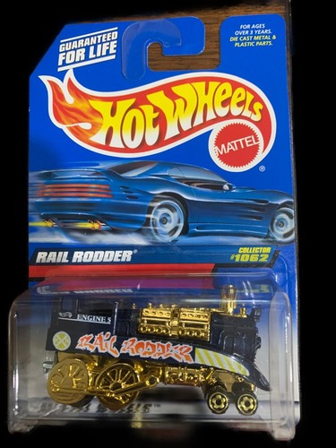 1999 Hot Wheels RAIL RODDER #1062. In sealed card. Black with gold trim ...